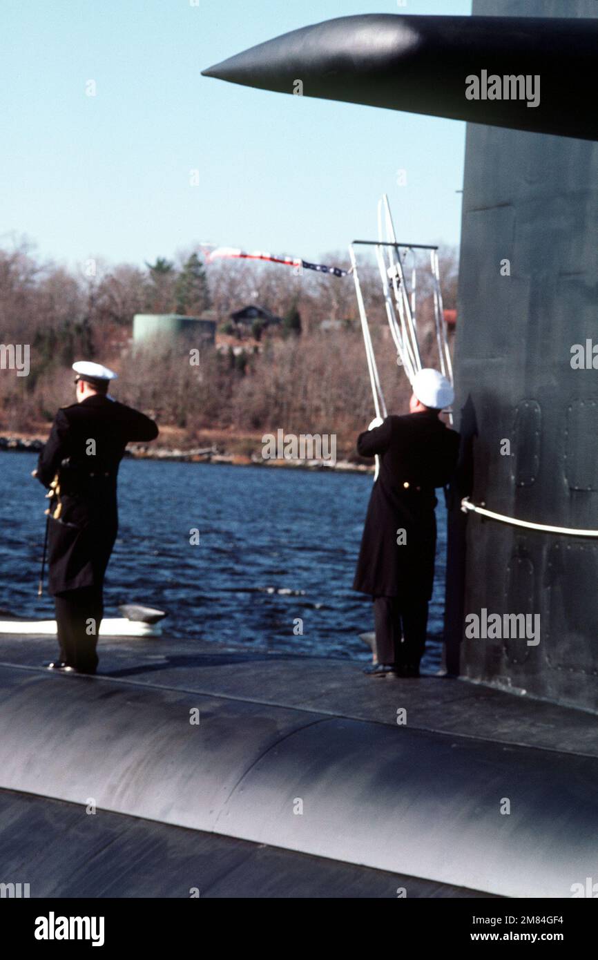The commissioning pennant is raised aboard the nuclear-powered attack ...