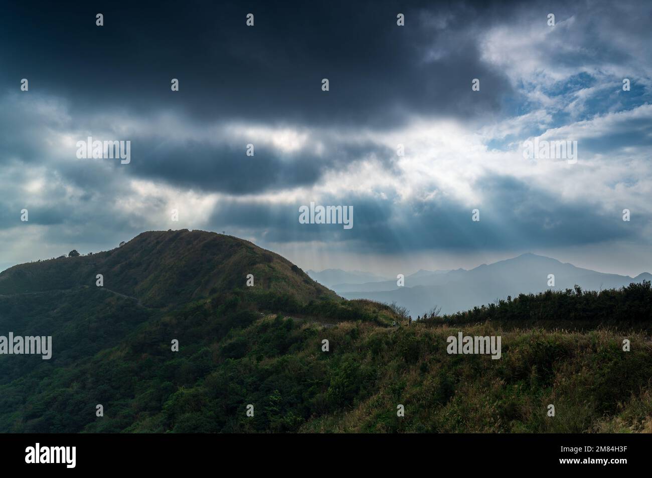 Watch the romantic Crepuscular Ray (cloud gap light) on the mountain ...