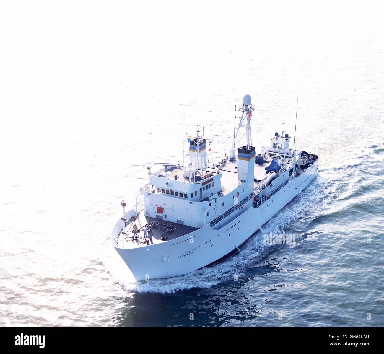 An elevated port bow view of the ocean surveillance ship USNS ...