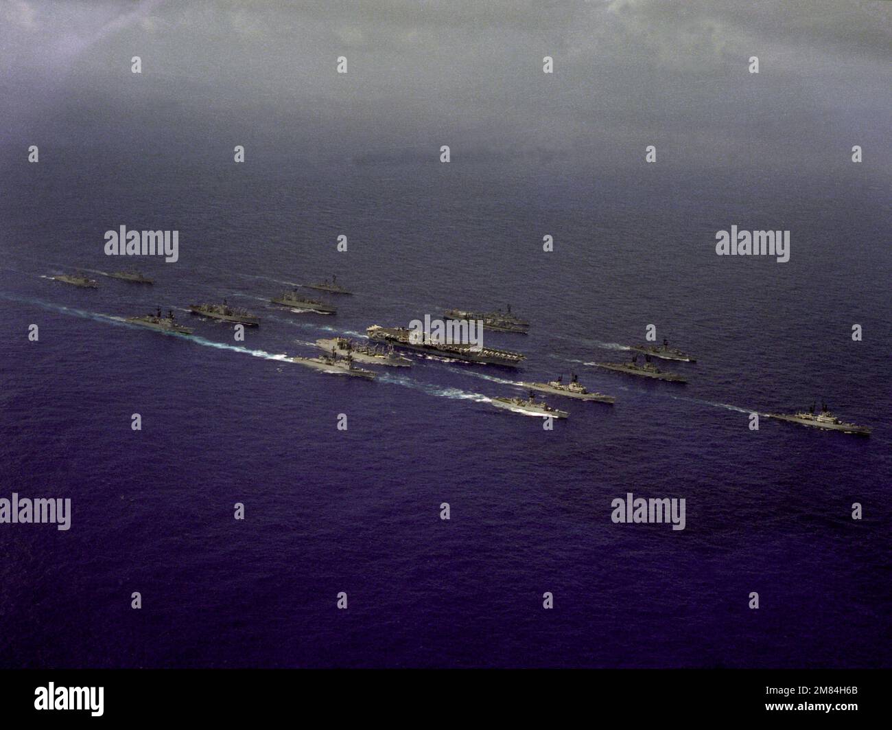 A aerial view of the aircraft carrier USS KITTY HAWK (CV-63) and other ...