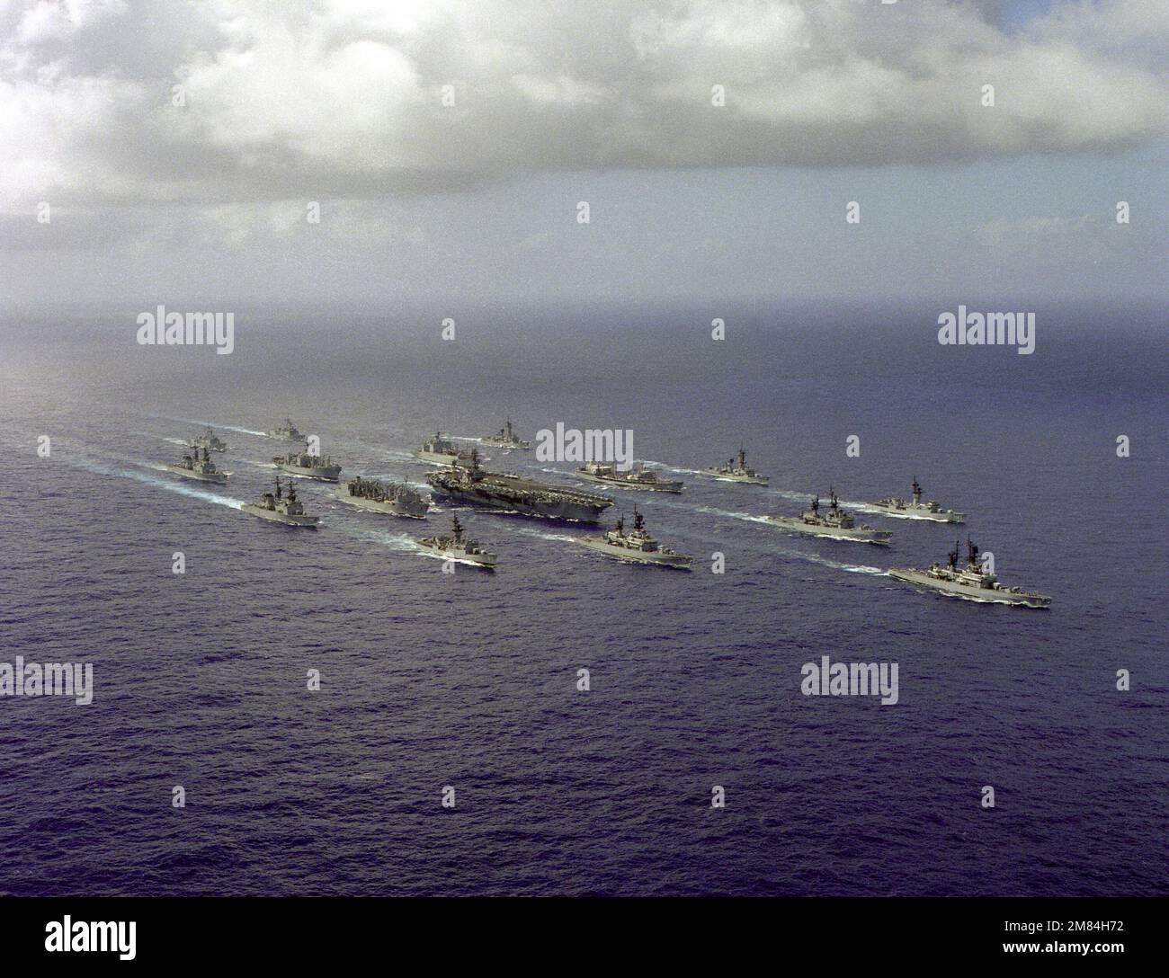 A aerial view of the aircraft carrier USS KITTY HAWK (CV-63) and other ...