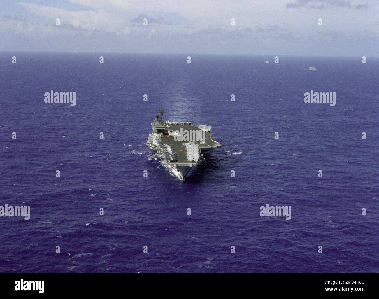 An aerial bow view of the aircraft carrier USS KITTY HAWK (CV-63 ...