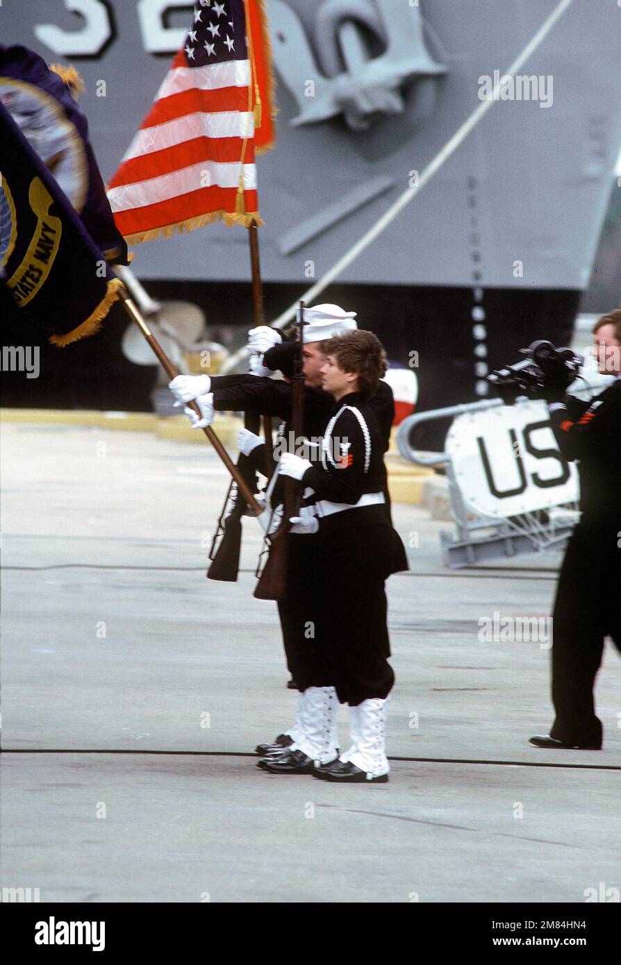 A U.S. Navy color guard presents the colors during the commissioning of ...