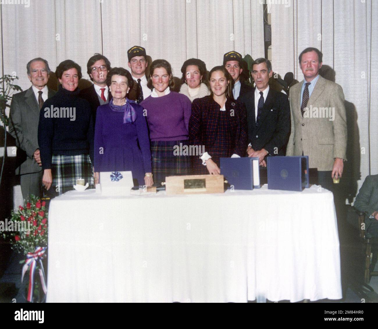 Sponsor Anne Gates and family attend a reception following the ...