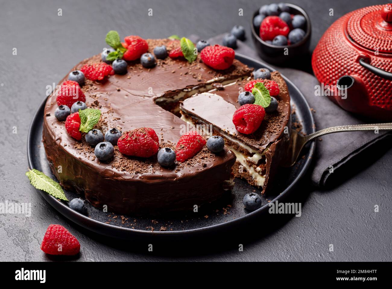 Chocolate cake dessert with fresh berries Stock Photo - Alamy