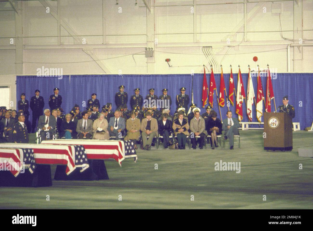 Mourners attend a memorial service for members of the 3rd Battalion ...