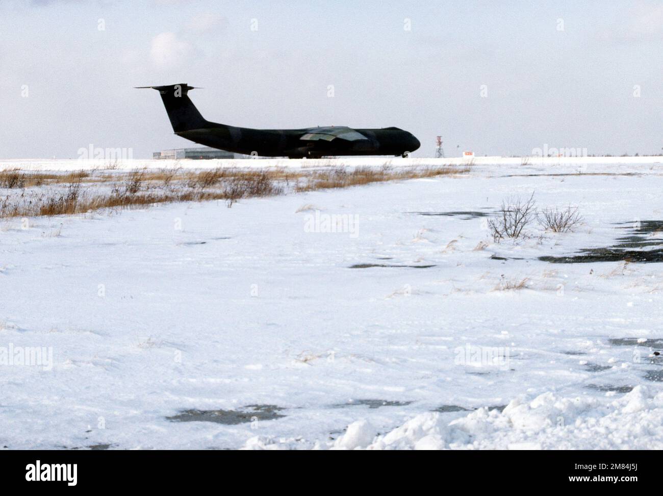 A 437th Military Airlift Wing C-141B Starlifter aircraft carrying the ...