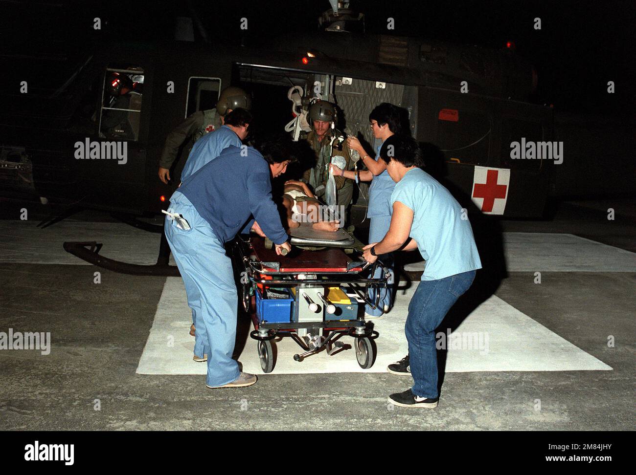 Emergency room personnel at Kuakini Hospital remove an accident victim ...