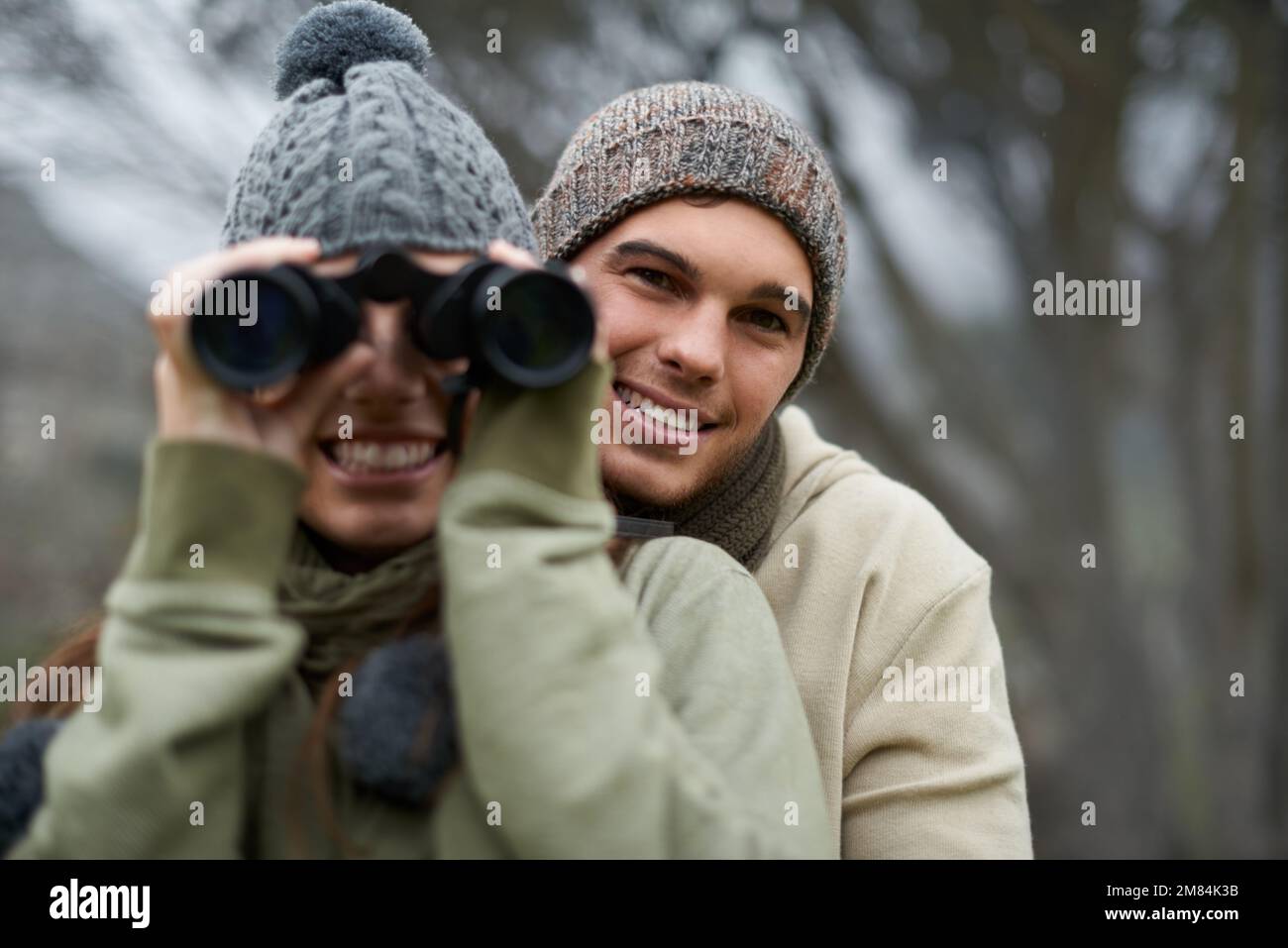 They share a passion for all things nature. A young couple taking in ...