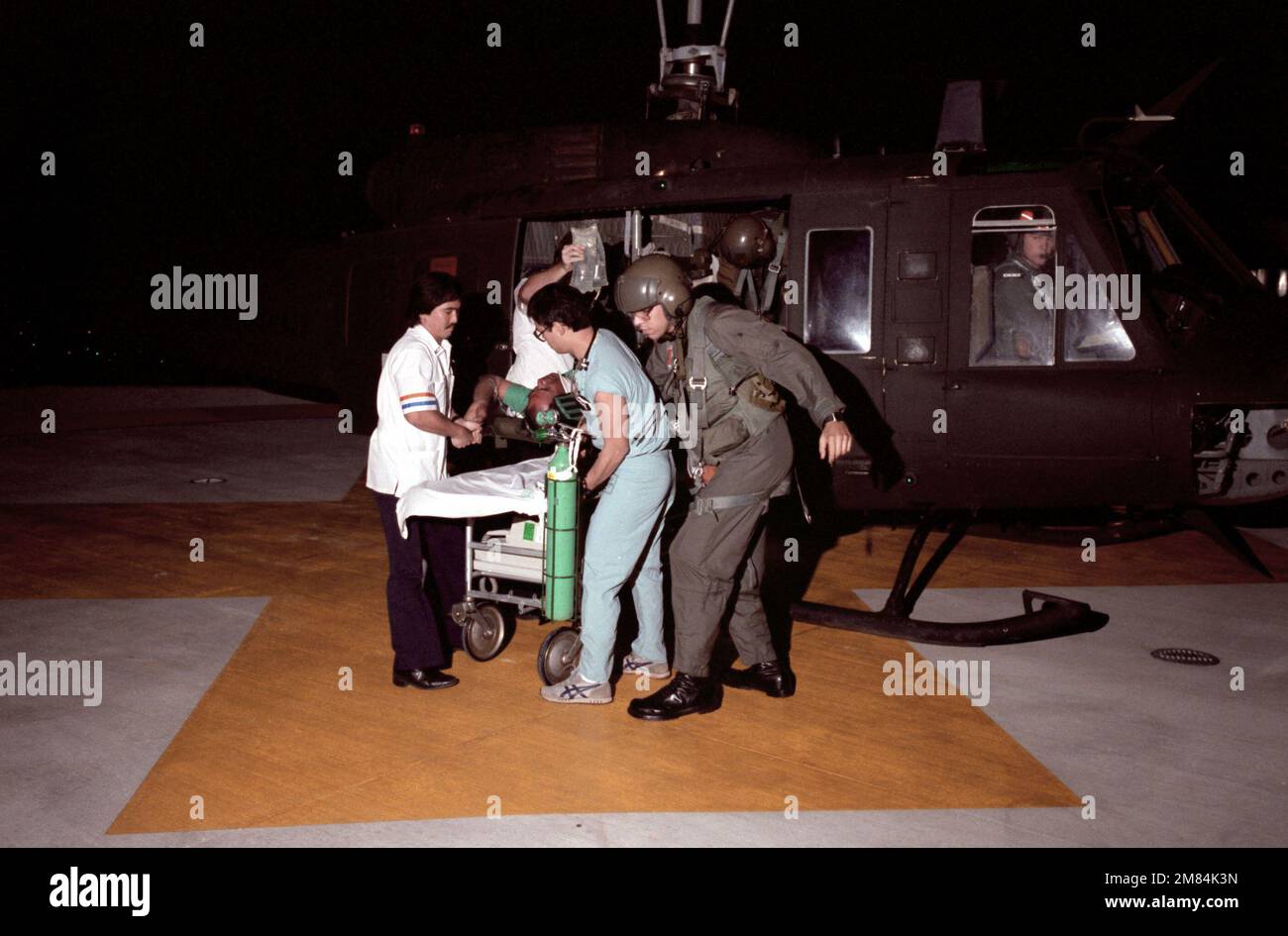 Sergeant Shawn Fawell, right, of the 68th Medical Detachment helps ...