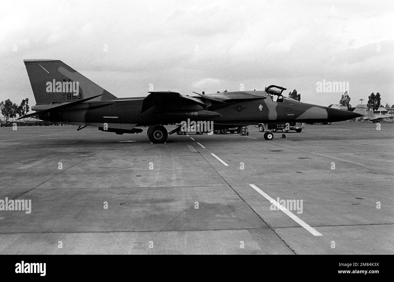A right side view of a U.S. Air Force F-111 aircraft parked on the ...