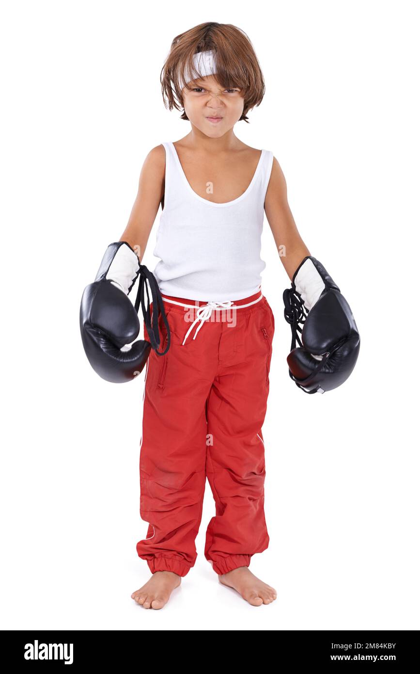 Hes got the boxer spirit. Portrait of a young boy in boxing gear ...
