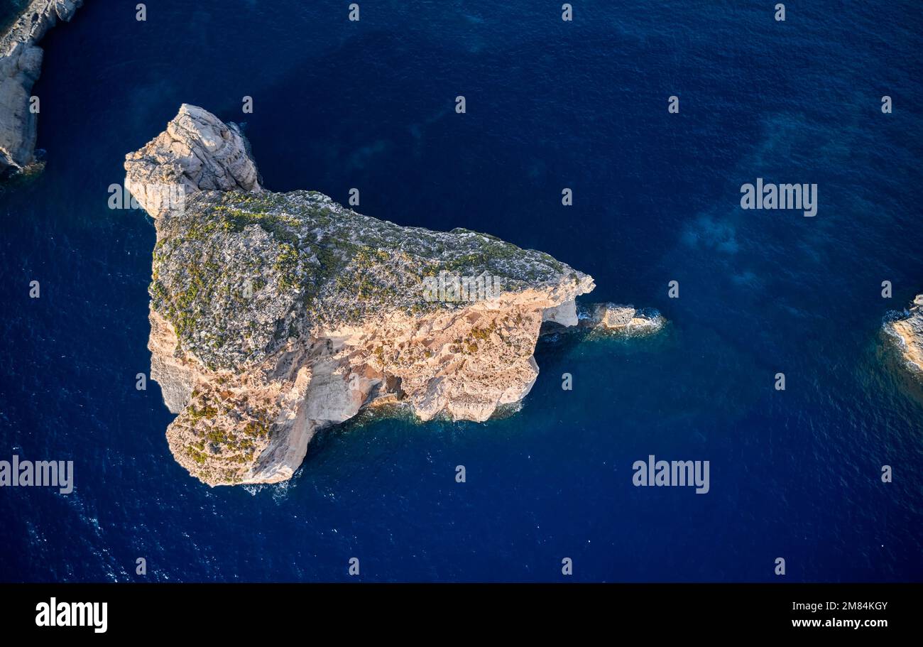 An aerial view of Fungus Rock in Dwejra bay, in Gozo island, Malta ...