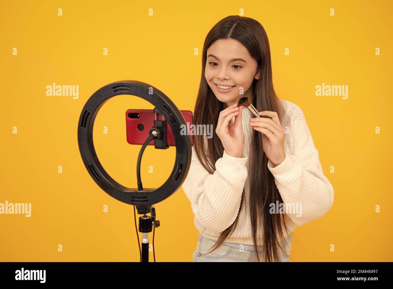 Teenager child recording video tutorial for social media with smart ...