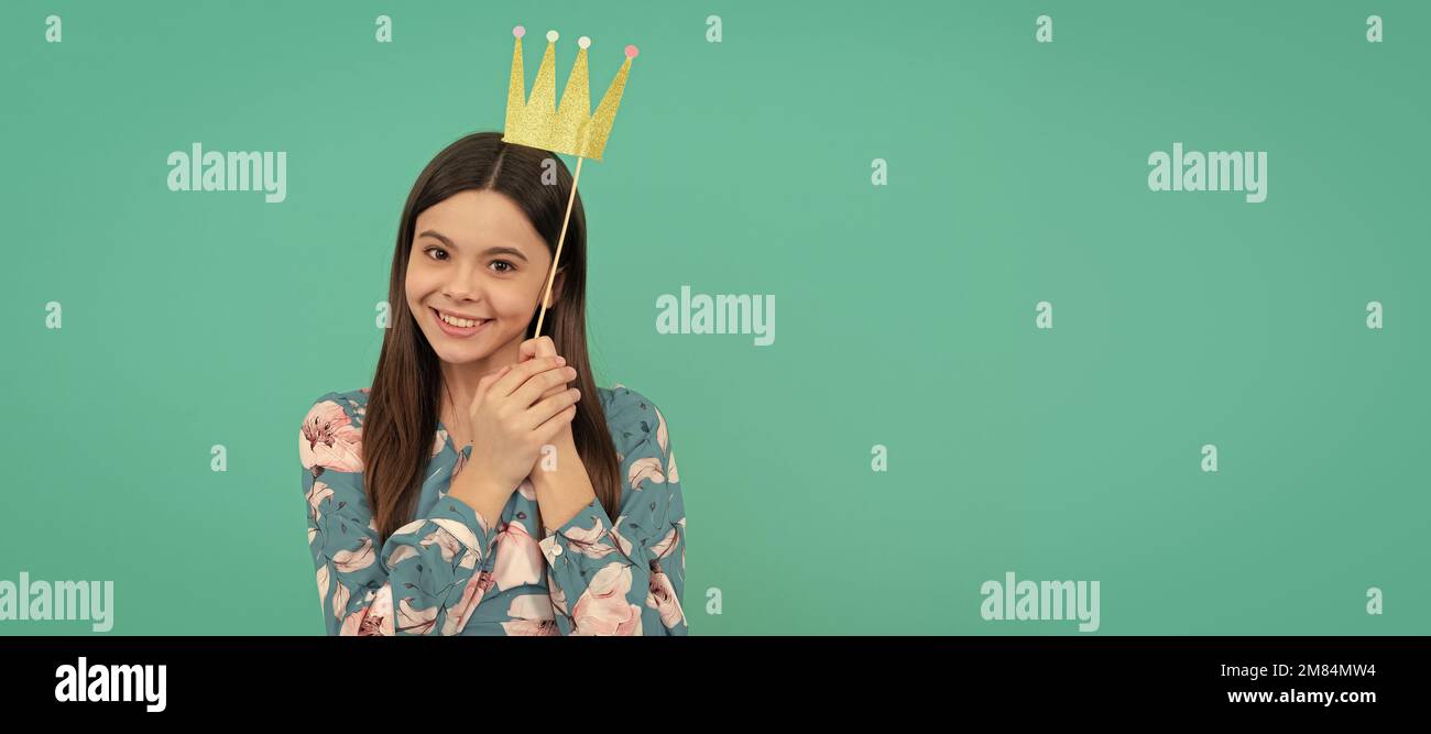 Happy girl princess smile holding prop crown blue background, prom ...