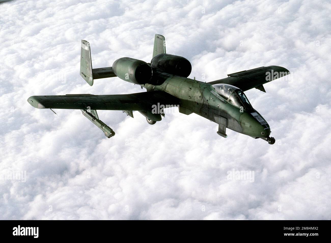 An air-to-air right front view of an 81st Tactical Fighter Wing A-10 ...