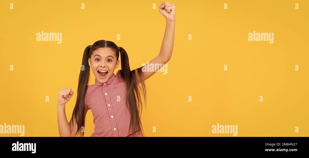 Happy enthusiastic kid make winning hand gesture screaming and ...