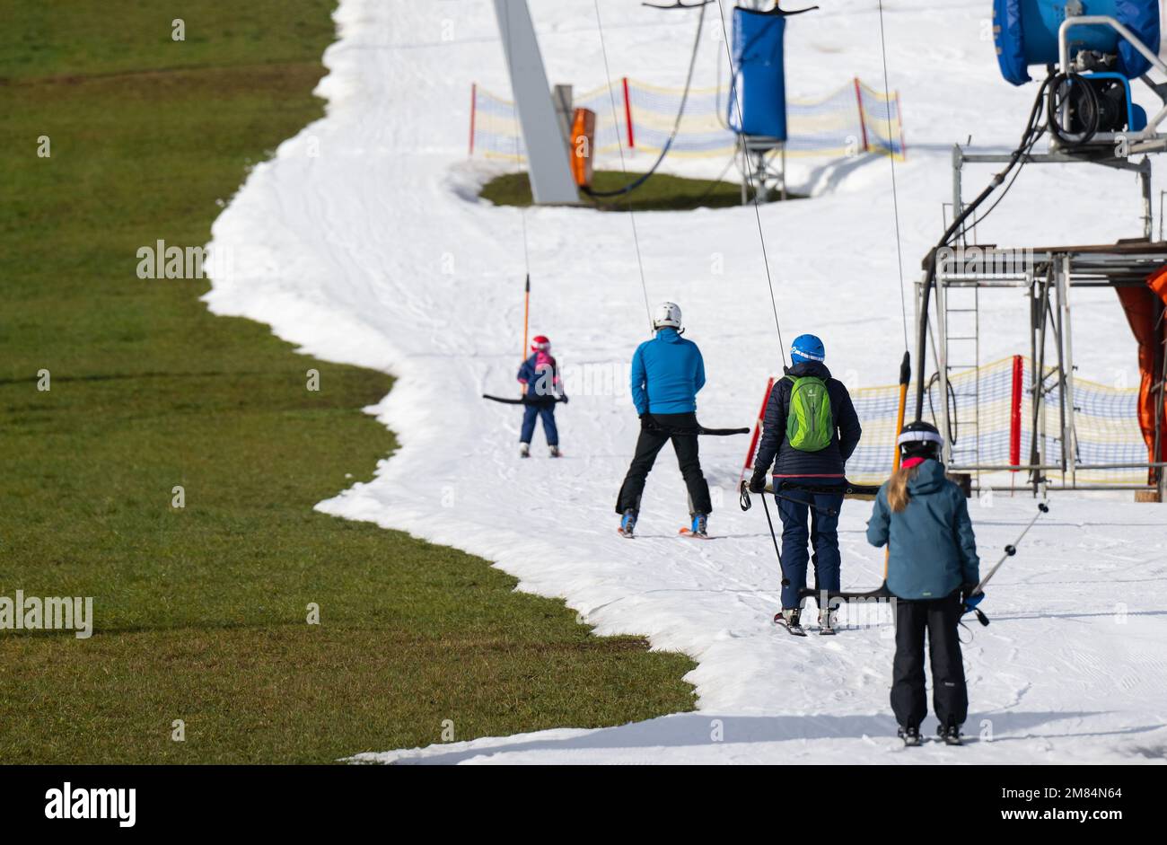 Ruhpolding, Germany. 12th Jan, 2023. Skiers skiing on a ski slope with ...
