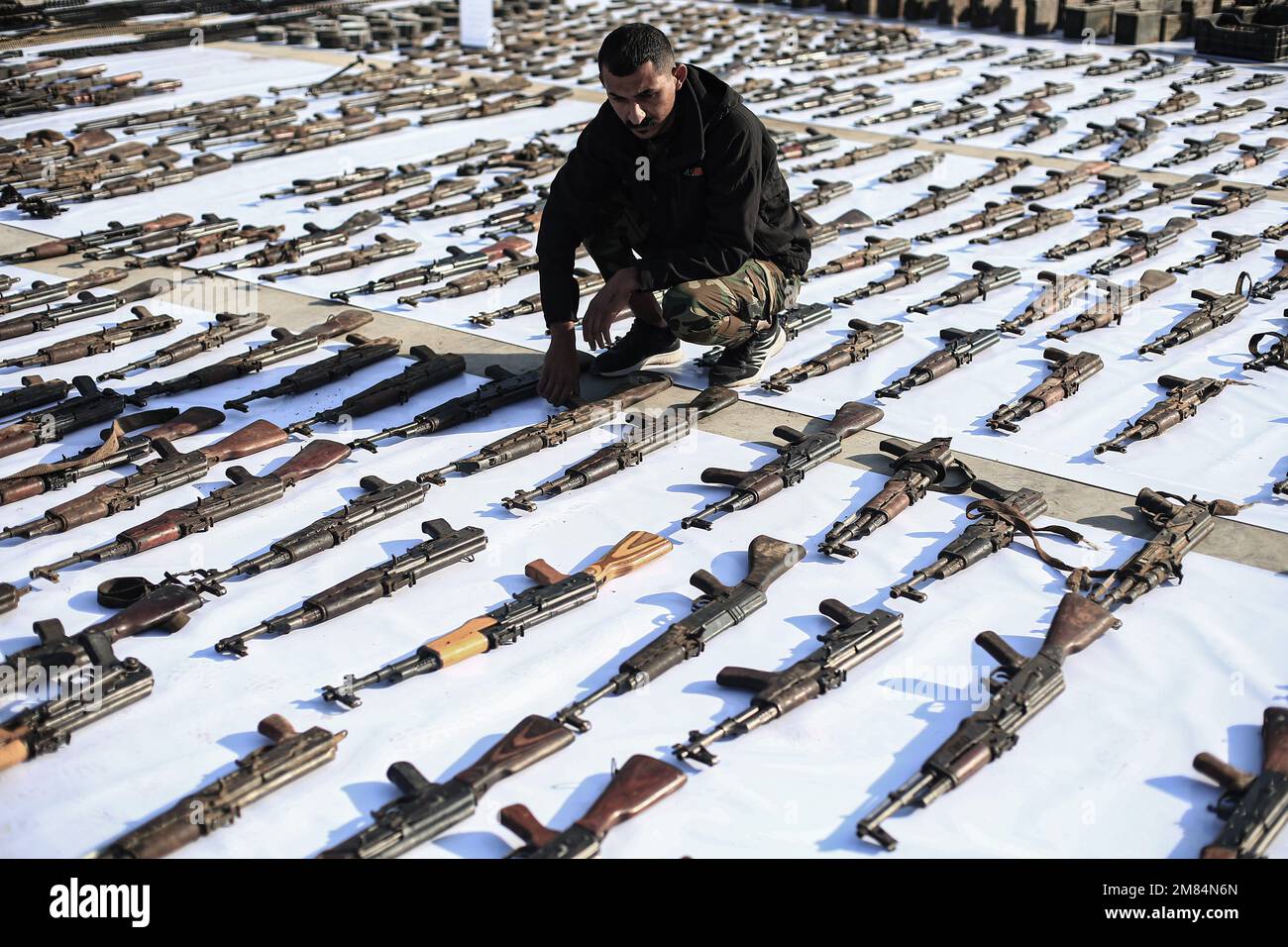 Baghdad, Iraq. 12th Jan, 2023. A general view of seized weapons ...