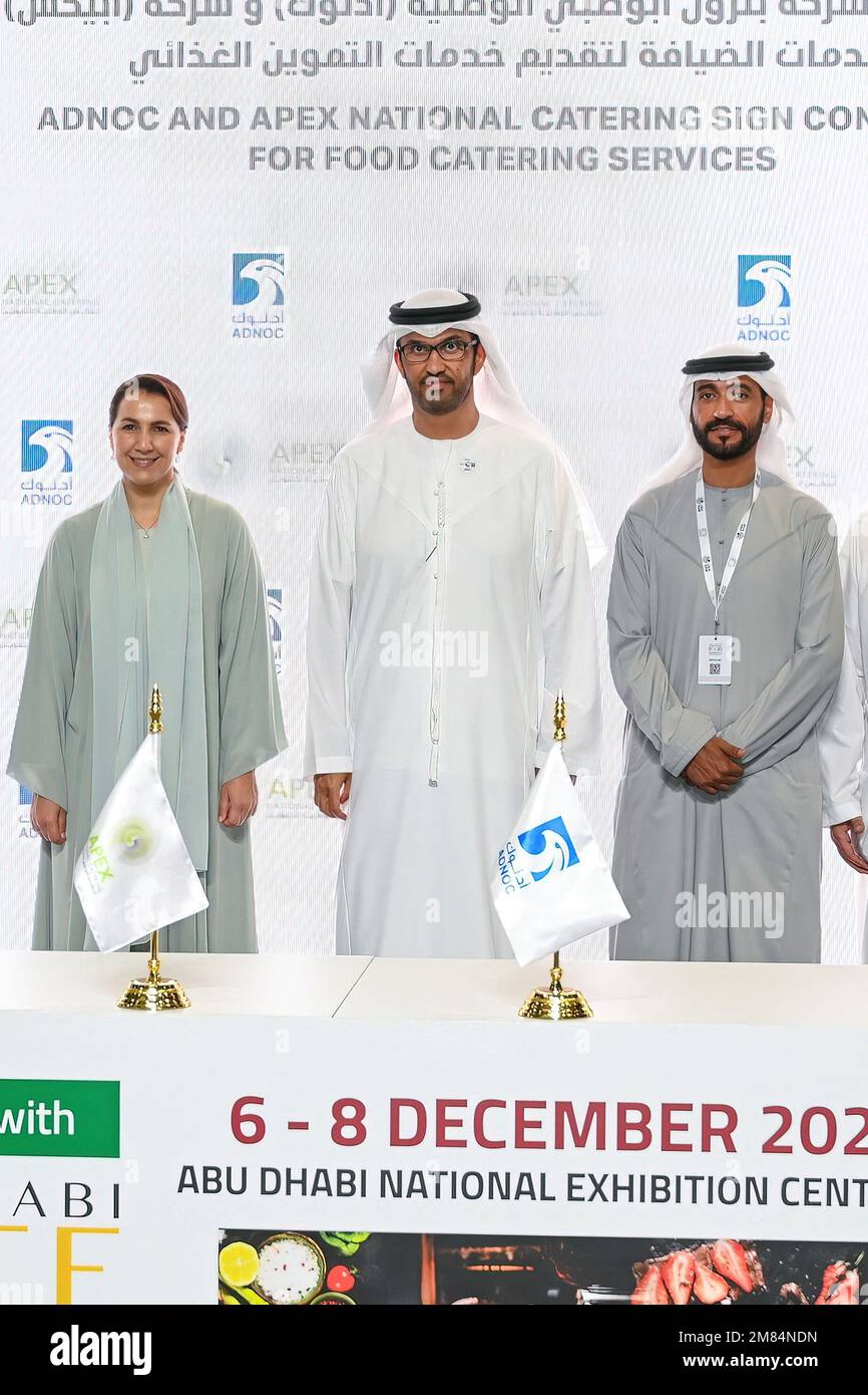 File photo dated December 2022 shows Sultan Ahmed Al Jaber (center ...