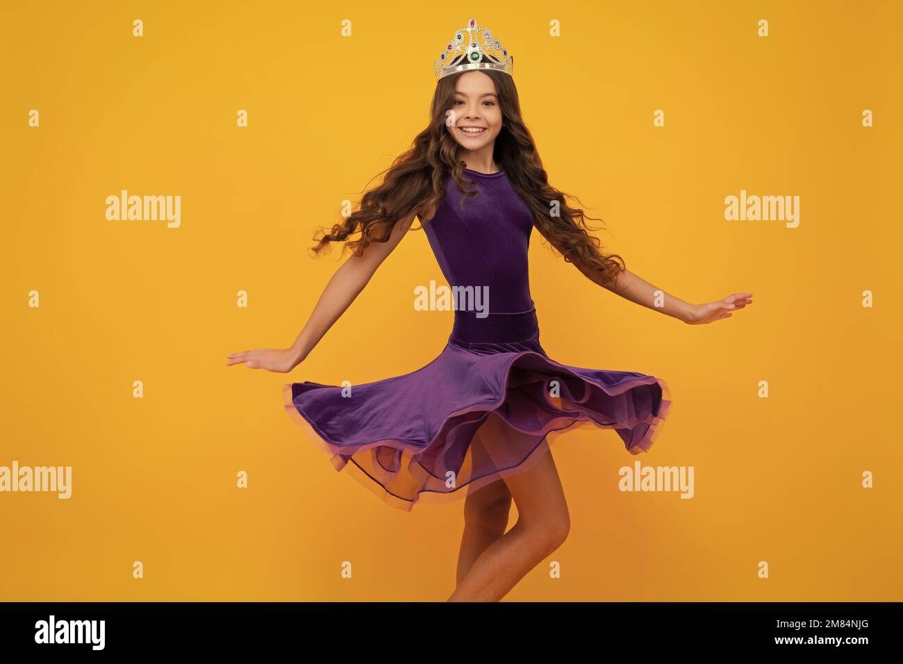 Movement windy dress. Girls birthday party, funny kid in crown. Imagine ...