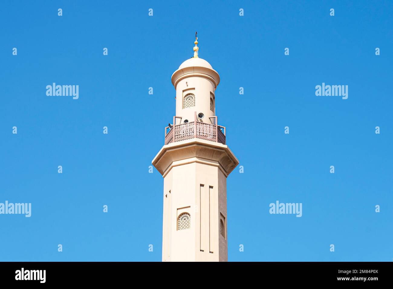 minaret of a mosque from muslim islamic culture, minarets on blue sky ...