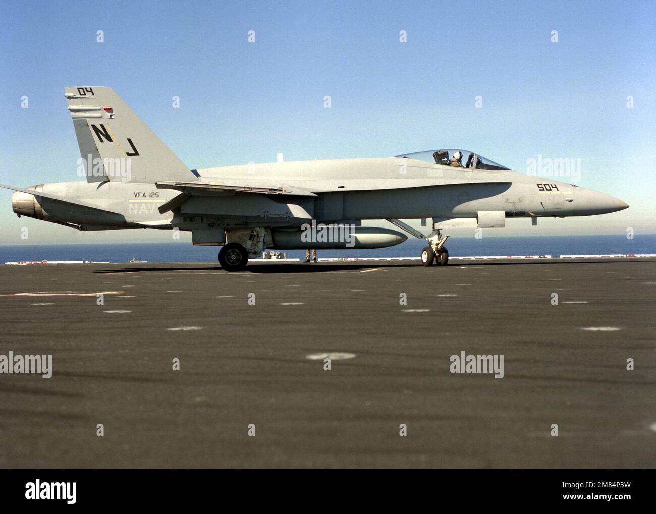 An F/A-18A Hornet aircraft of Fighter Squadron 125 (VFA-125) taxis on ...