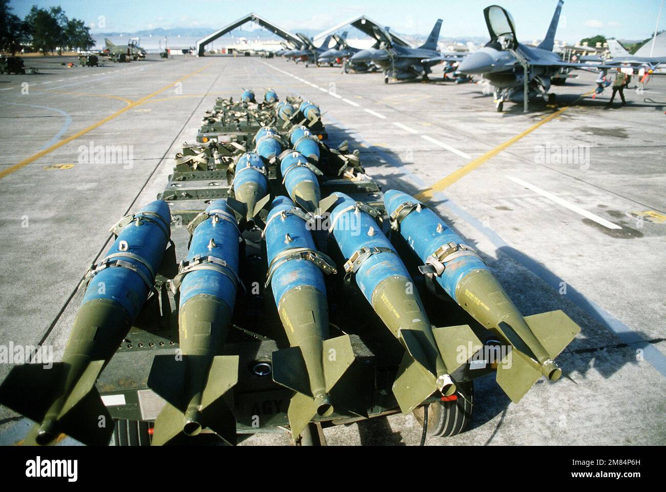 Racks of Mark 82 500-pound general-purpose bombs are lined up on the ...