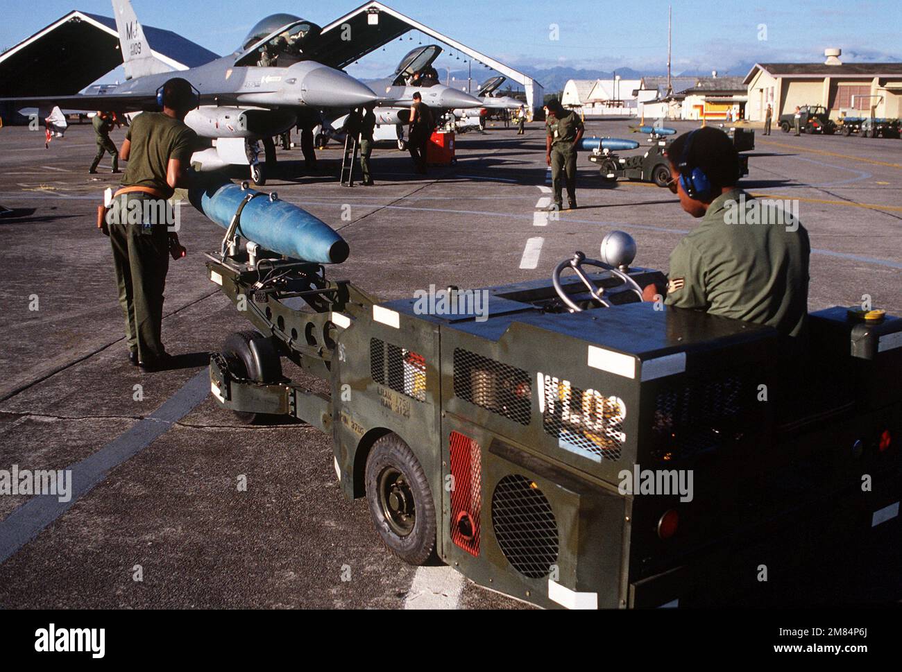 Members of the 432nd Aircraft Generation Squadron load Mark 82 500 ...