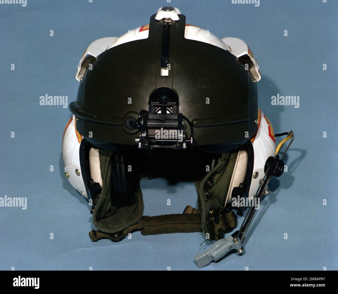 A flight helmet equipped with a bracket for the AN/AVS-6(V) aviator's ...