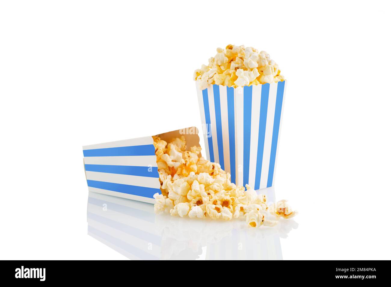 Two blue white striped carton buckets with tasty cheese popcorn ...