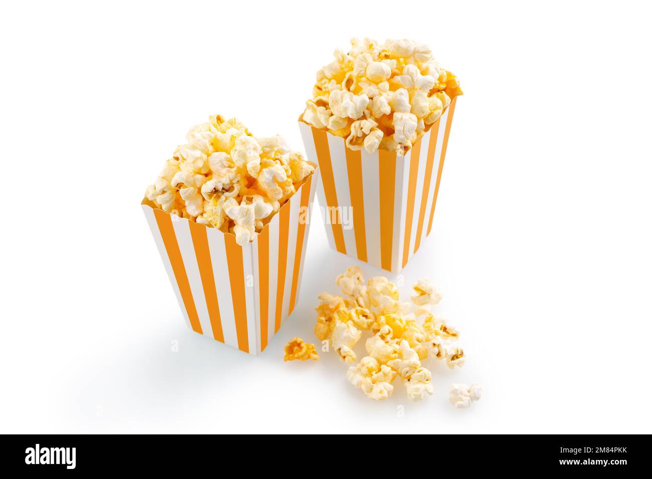 Two yellow white striped carton buckets with tasty cheese popcorn ...