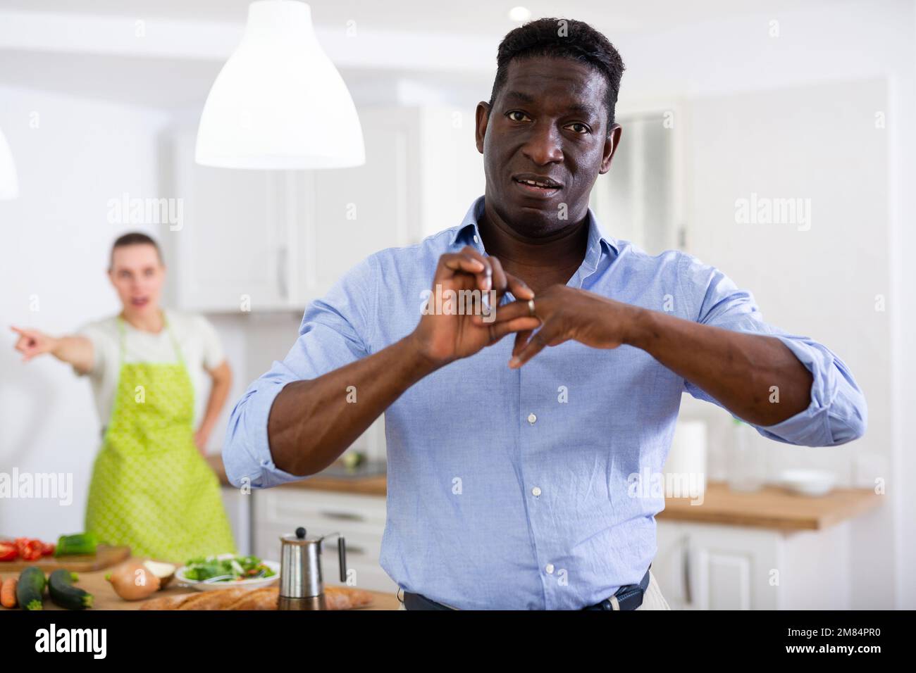 Husband defiantly removes wedding ring from his finger Stock Photo - Alamy