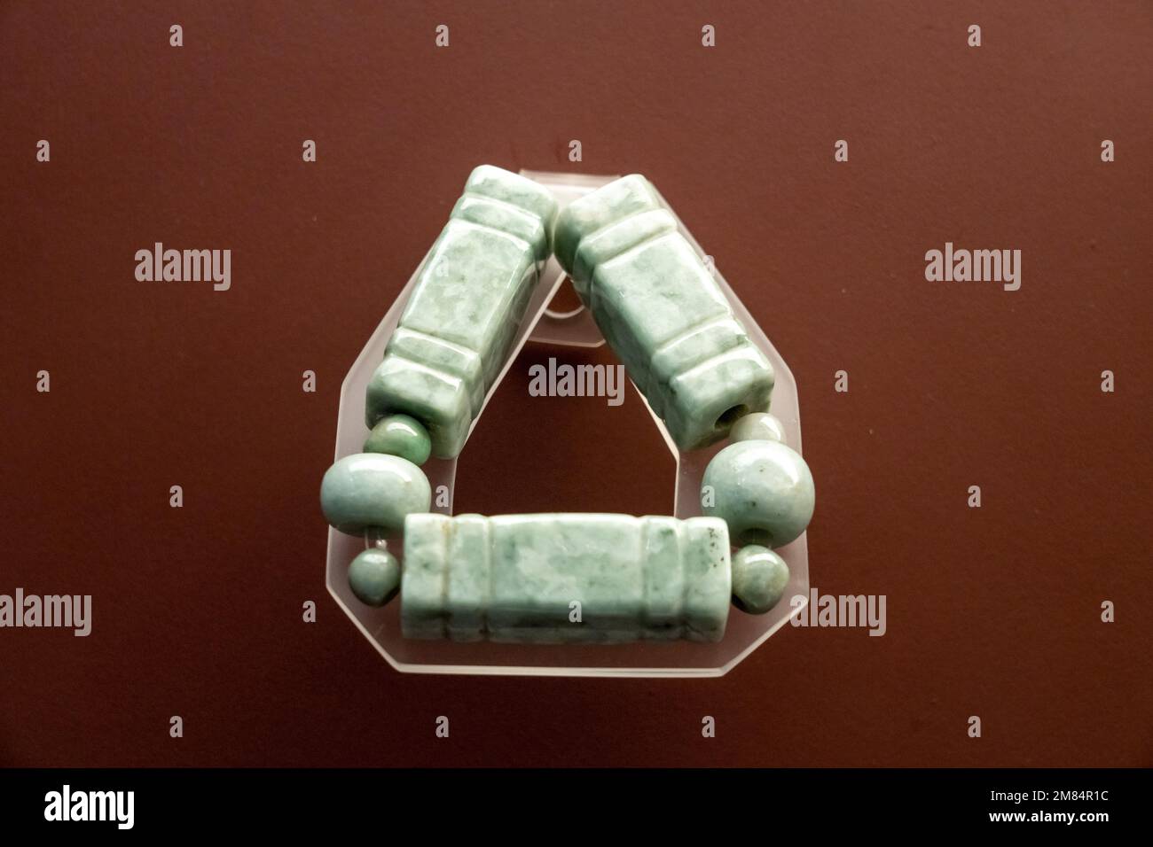 A large, triangular jade necklace in the Museum of Cultures of Oaxaca ...