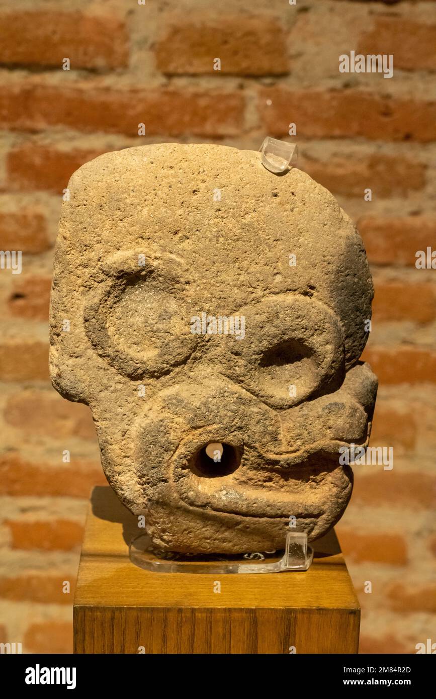 Ceremonial carved stone axe head in the shape of a jaguar from the pre ...