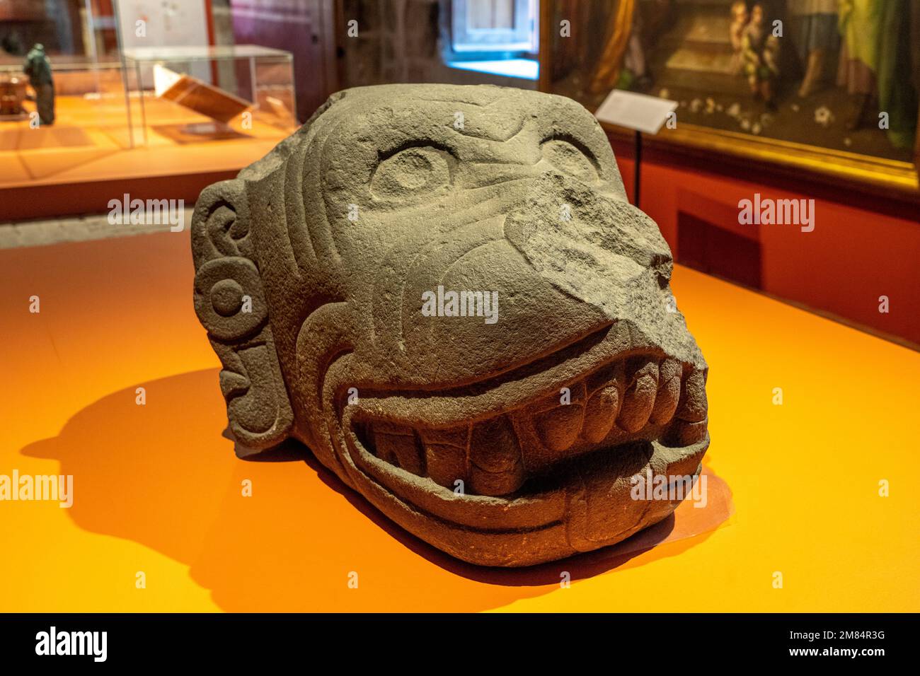A large basalt stone carving of the head of Xolotl or the Dog God from ...