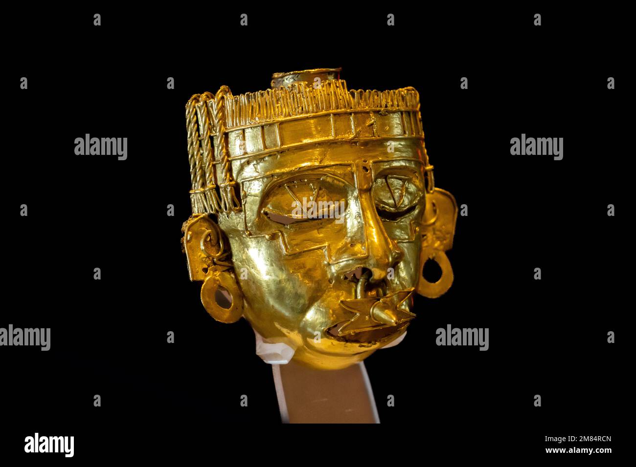 Gold representation of the deity Xipe Totec. Museum of Cultures of ...