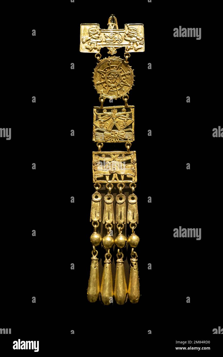 Gold pectoral showing the order of the universe from Tomb 7 at Monte ...