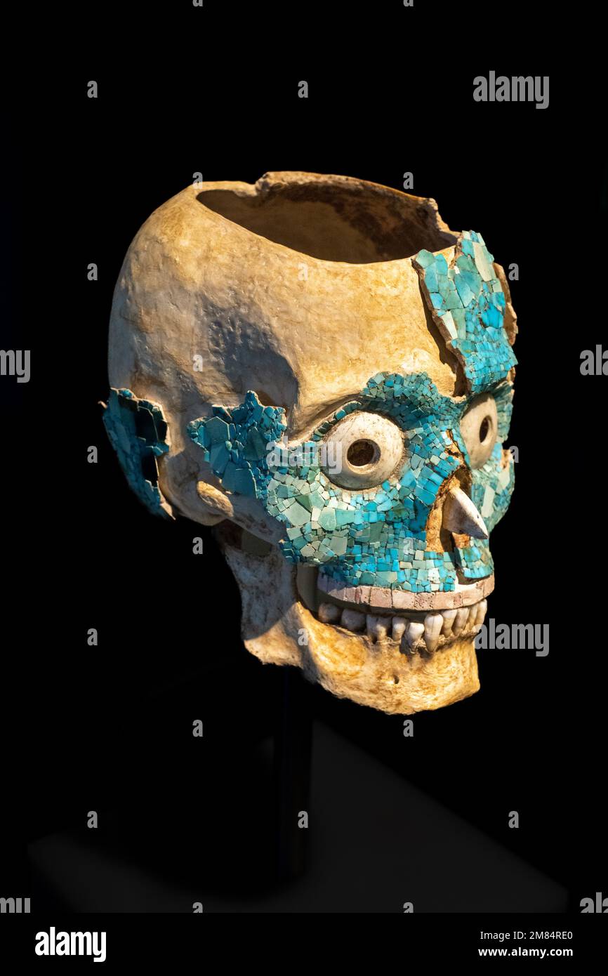 A tourquoise-covered skull from Tomb 7 at Monte Alban, Oaxaca, Mexico ...