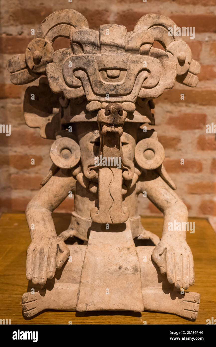 Pre-Hispanic ceramic Zapotec funerary effigy-urn of Cocijo, the god of ...