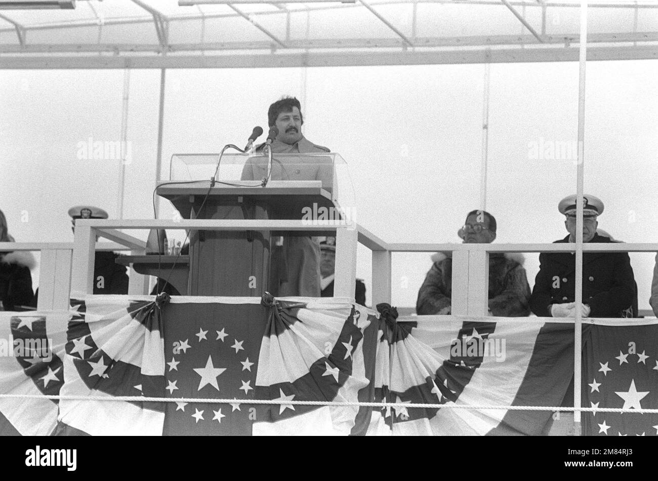 A distinguished guest speaks during the commissioning of the nuclear ...
