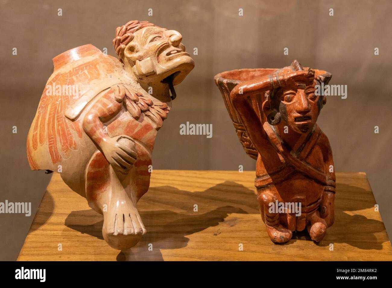 Pre-Hispanic ceramic ritual or funerary pots with human figures in the ...