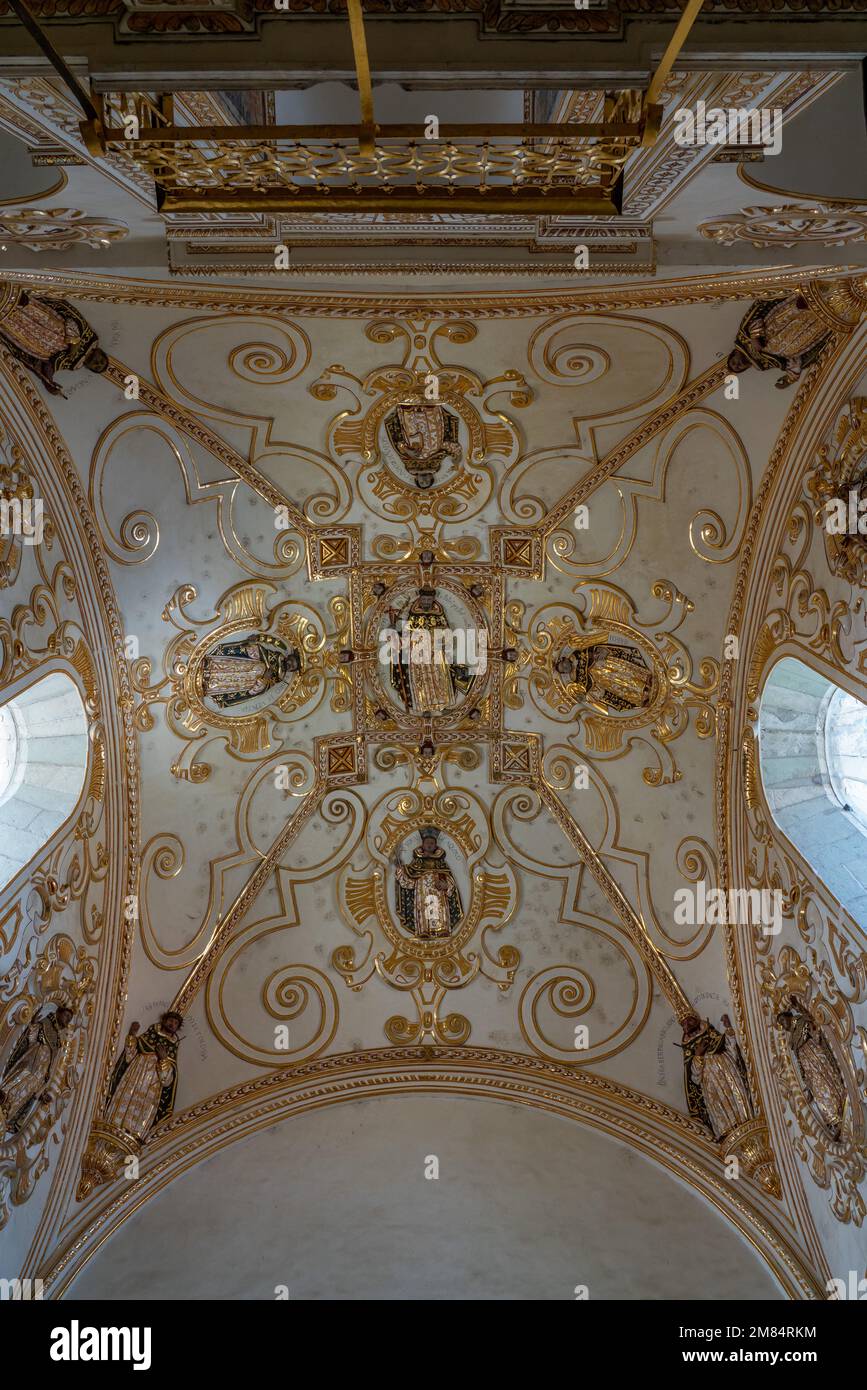 Ornately decorated ceiling dome with religious art in the former ...
