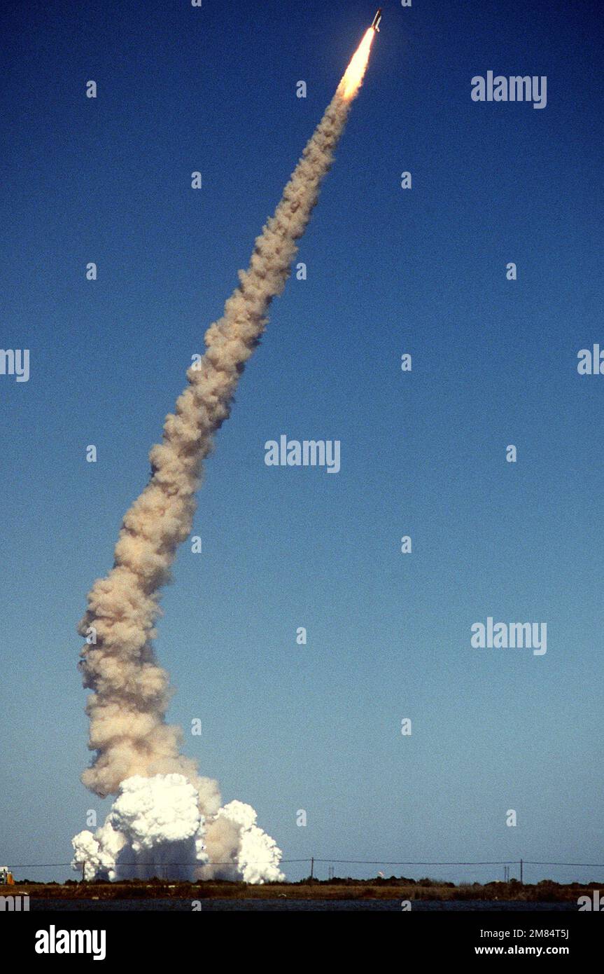 The Space Shuttle Challenger lifts off from its launch pad at the ...