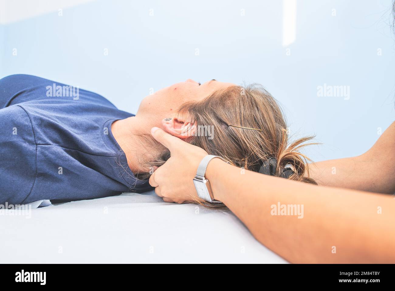 Neck And Neck Treatment In The Doctor's Office Stock Photo - Alamy
