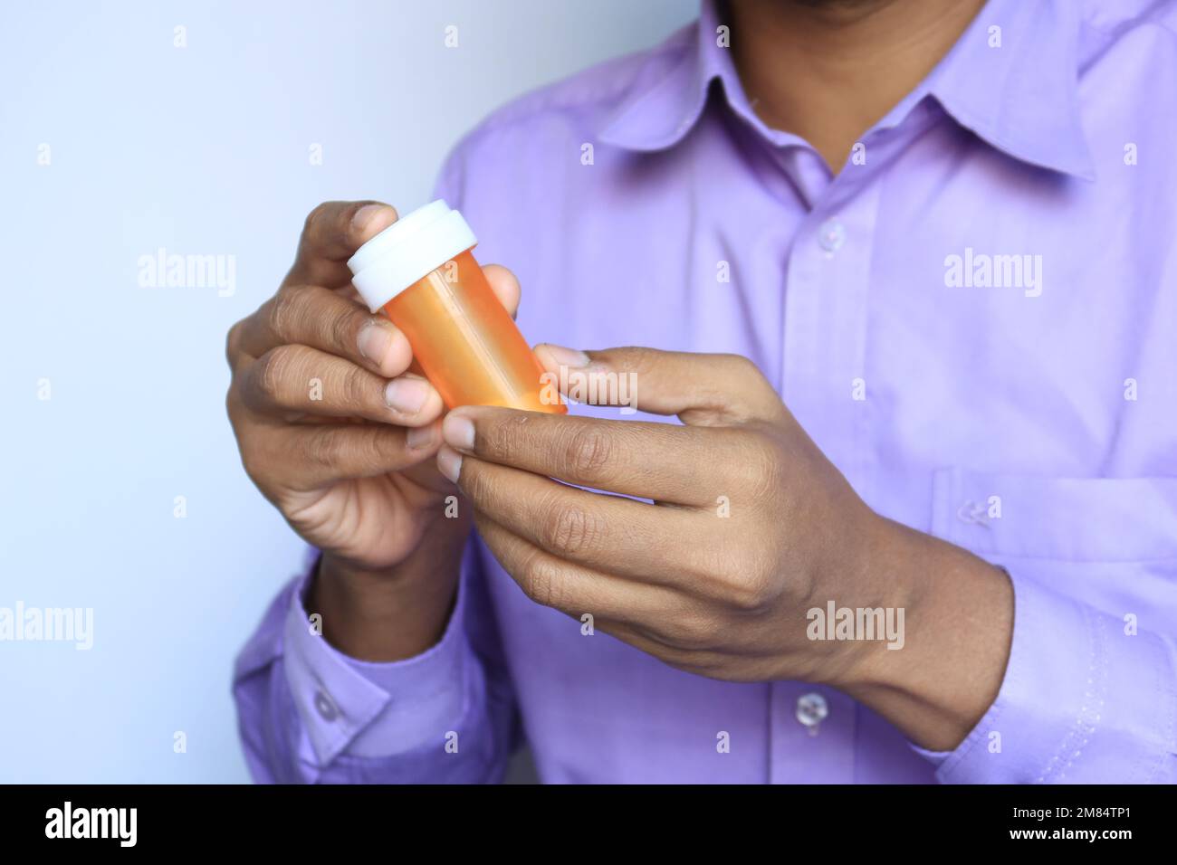 Person hand holding pill container hi-res stock photography and images ...