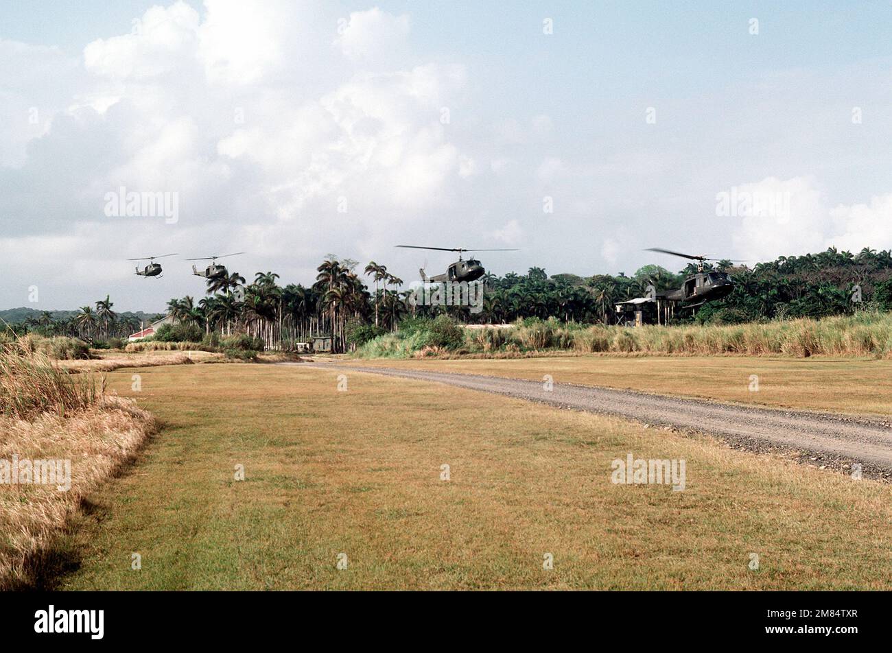 U.S. Army UH-1 Iroquois helicopters land near Howard Air Force Base ...