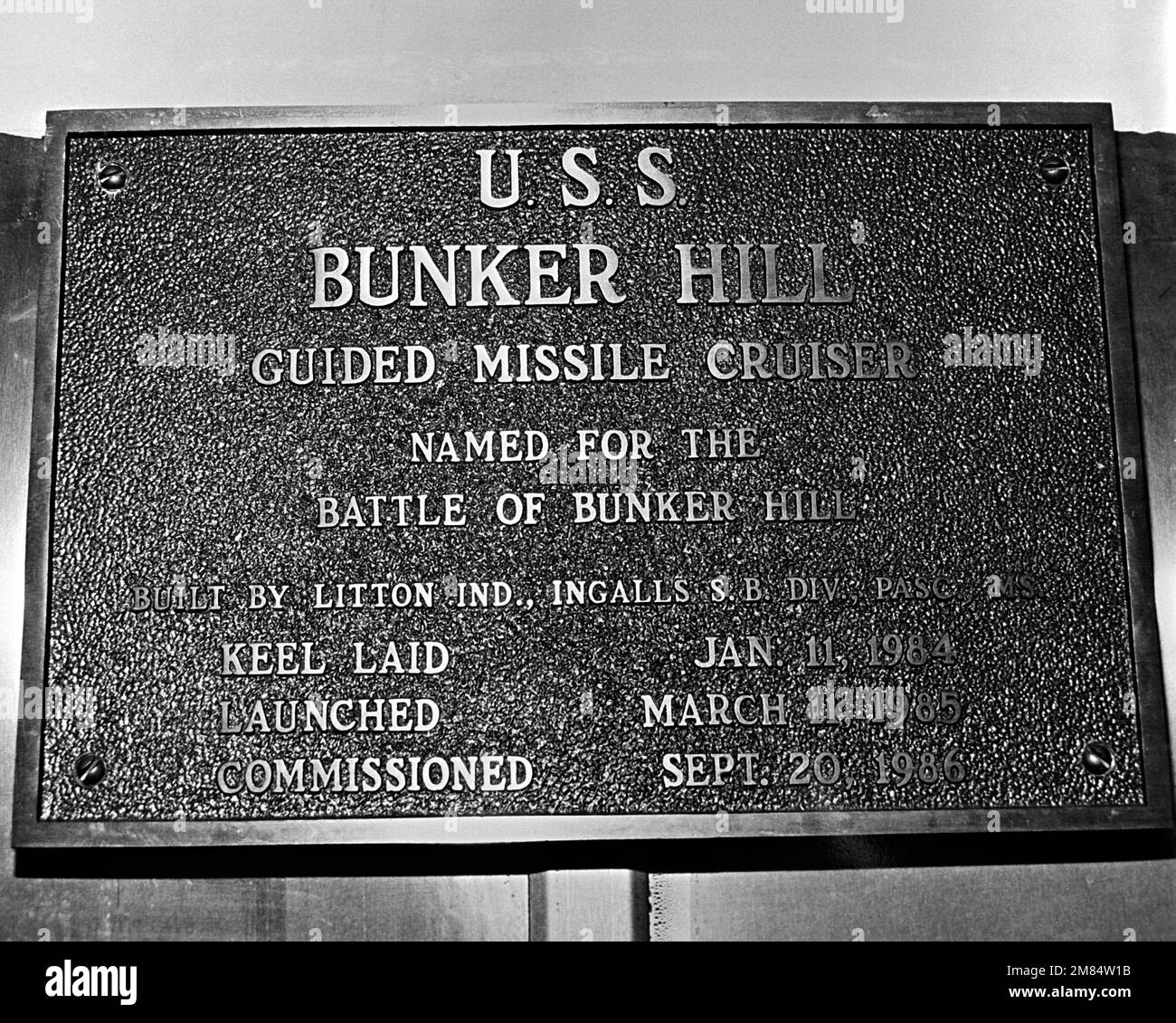A historical plaque aboard the guided missile cruiser USS BUNKER HILL ...