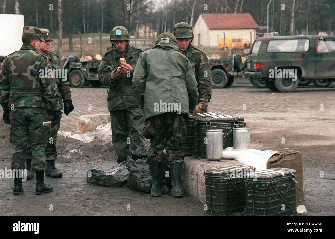 Soldiers take a break while loading ground support equipment aboard ...