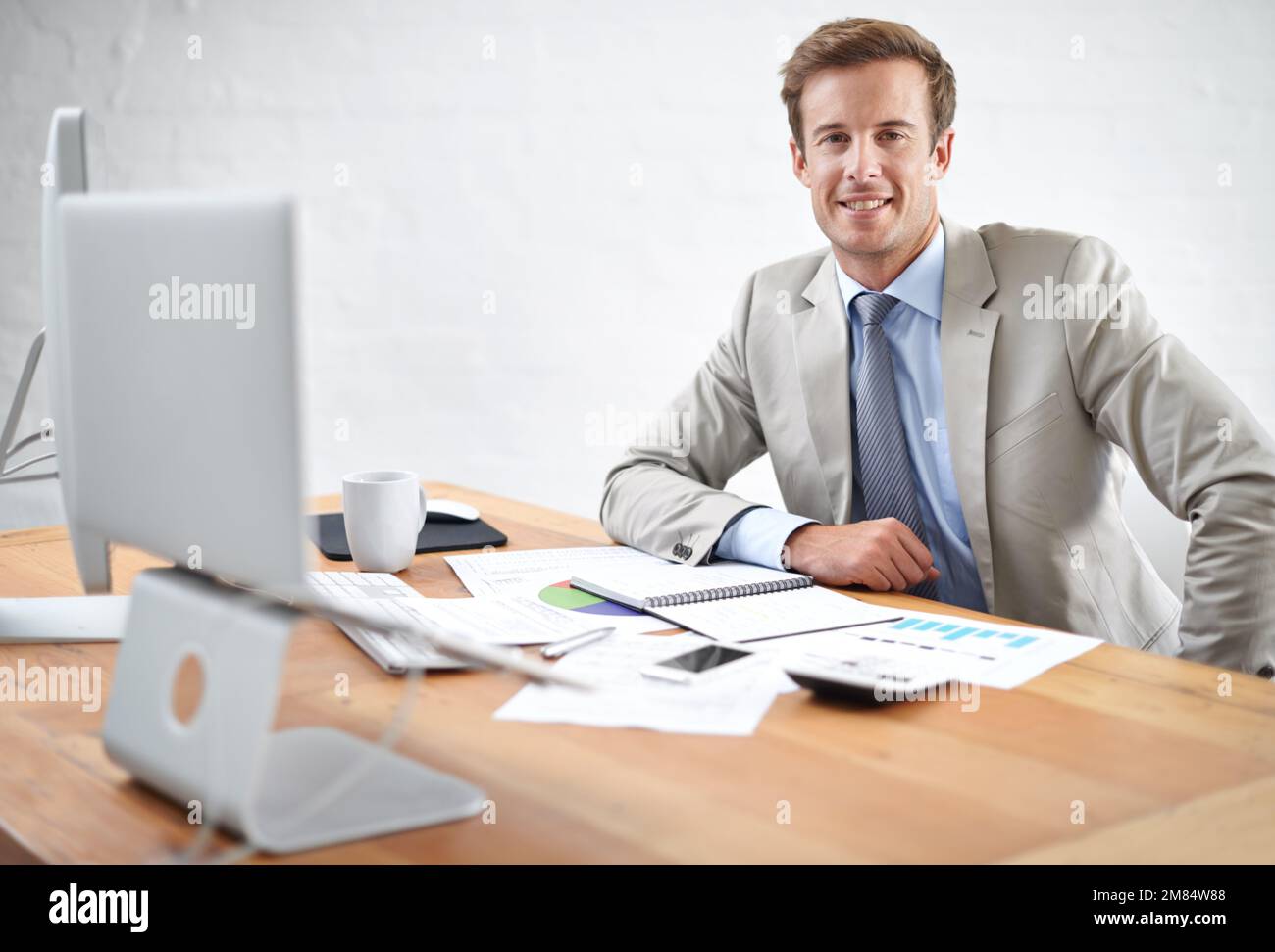 Hes confident in his investment choices. Portrait of a handsome young ...